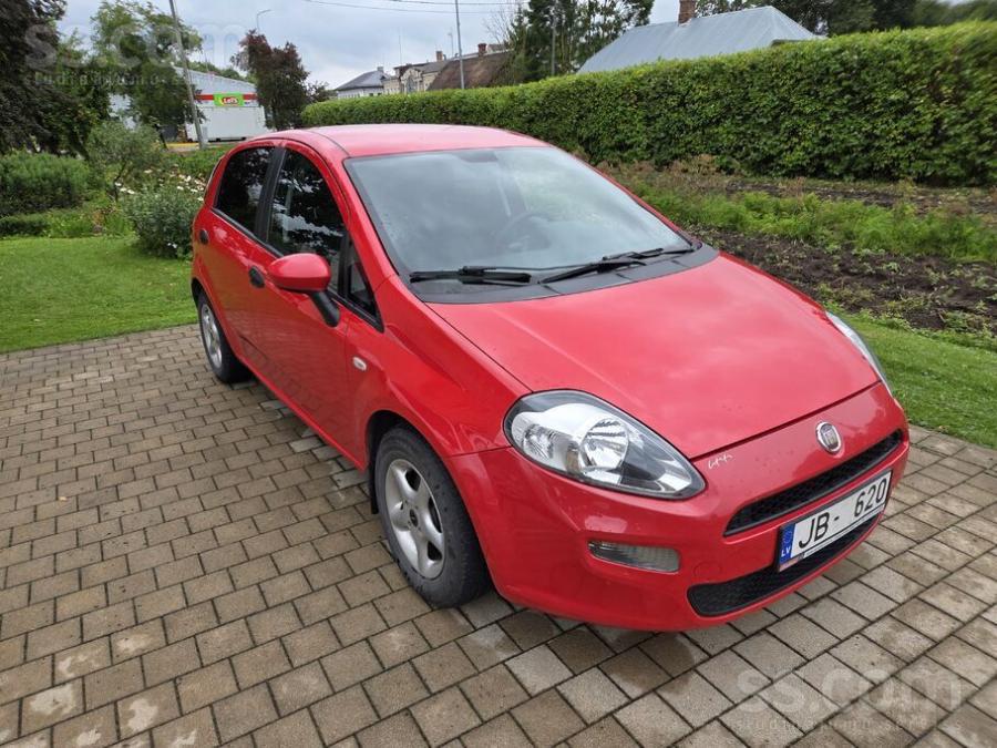 Red Fiat Punto 2012 in Riga, with an engine capacity of 1.30 L and mileage of 202 thousand km for 2450 €, photo 1 on AUTOMOTO.COM.LV