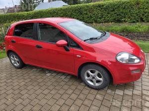 Red Fiat Punto 2012 in Riga, with an engine capacity of 1.30 L and mileage of 202 thousand km for 2450 €, photo 3 on AUTOMOTO.COM.LV