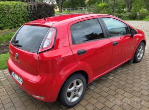 Red Fiat Punto 2012 in Riga, with an engine capacity of 1.30 L and mileage of 202 thousand km for 2450 €, photo 4 on AUTOMOTO.COM.LV