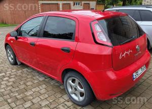 Red Fiat Punto 2012 in Riga, with an engine capacity of 1.30 L and mileage of 202 thousand km for 2450 €, photo 6 on AUTOMOTO.COM.LV