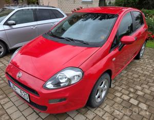 Red Fiat Punto 2012 in Riga, with an engine capacity of 1.30 L and mileage of 202 thousand km for 2450 €, photo 8 on AUTOMOTO.COM.LV