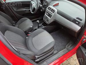Red Fiat Punto 2012 in Riga, with an engine capacity of 1.30 L and mileage of 202 thousand km for 2450 €, photo 10 on AUTOMOTO.COM.LV