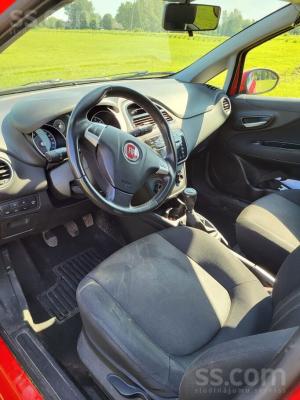 Red Fiat Punto 2013 in Riga, with an engine capacity of 1.20 L and mileage of 166 thousand km for 2100 €, photo 7 on AUTOMOTO.COM.LV