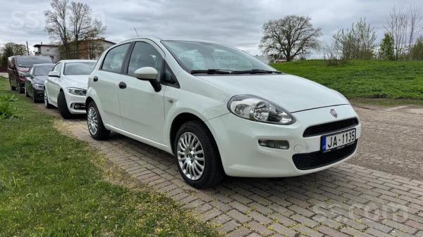 White Fiat Punto 2012 in Riga, with an engine capacity of 1.30 L and mileage of 290 thousand km for 2390 €, photo 1 on AUTOMOTO.COM.LV