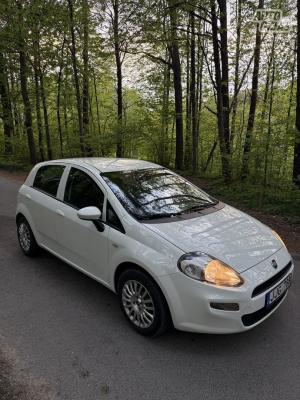 White Fiat Punto 2016 in Vilnius, with an engine capacity of 1.20 L and mileage of 127 thousand km for 4300 €, photo  on AUTOMOTO.COM.LV
