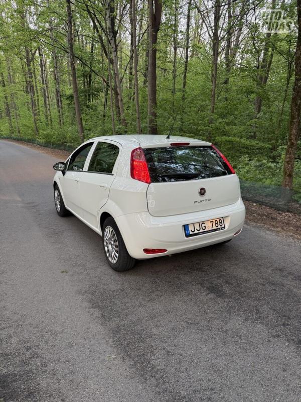 White Fiat Punto 2016 in Vilnius, with an engine capacity of 1.20 L and mileage of 127 thousand km for 4300 €, photo 6 on AUTOMOTO.COM.LV