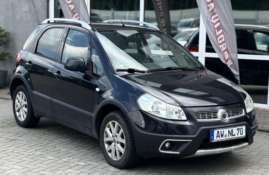 Melns Fiat Sedici 2011 Radviliškis, ar dzinēja tilpumu 2.00 L un nobraukumu 246 tūkst. km par 3550 €, foto 5 vietnē AUTOMOTO.COM.LV