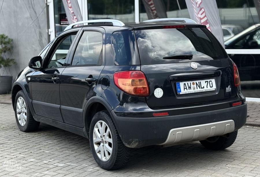 Melns Fiat Sedici 2011 Radviliškis, ar dzinēja tilpumu 2.00 L un nobraukumu 246 tūkst. km par 3550 €, foto 13 vietnē AUTOMOTO.COM.LV
