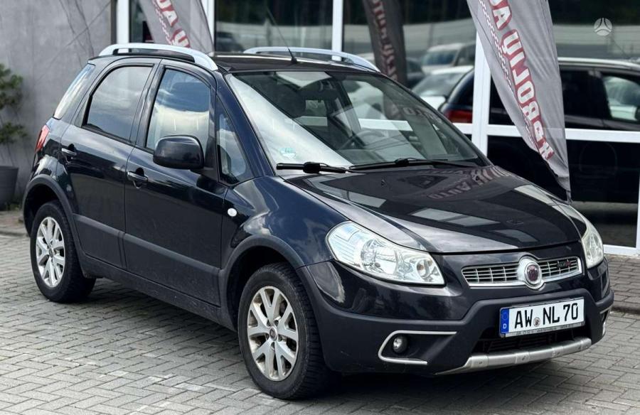 Melns Fiat Sedici 2011 Radviliškis, ar dzinēja tilpumu 2.00 L un nobraukumu 246 tūkst. km par 3550 €, foto 5 vietnē AUTOMOTO.COM.LV