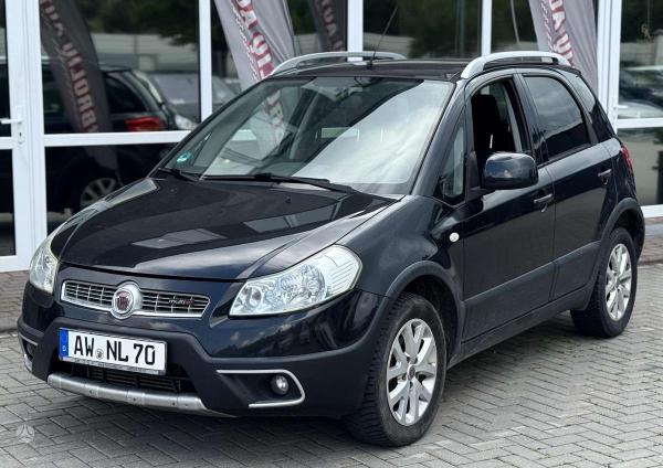 Melns Fiat Sedici 2011 Radviliškis, ar dzinēja tilpumu 2.00 L un nobraukumu 246 tūkst. km par 3550 €, foto 5 vietnē AUTOMOTO.COM.LV