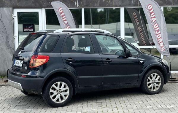 Melns Fiat Sedici 2011 Radviliškis, ar dzinēja tilpumu 2.00 L un nobraukumu 246 tūkst. km par 3550 €, foto 7 vietnē AUTOMOTO.COM.LV