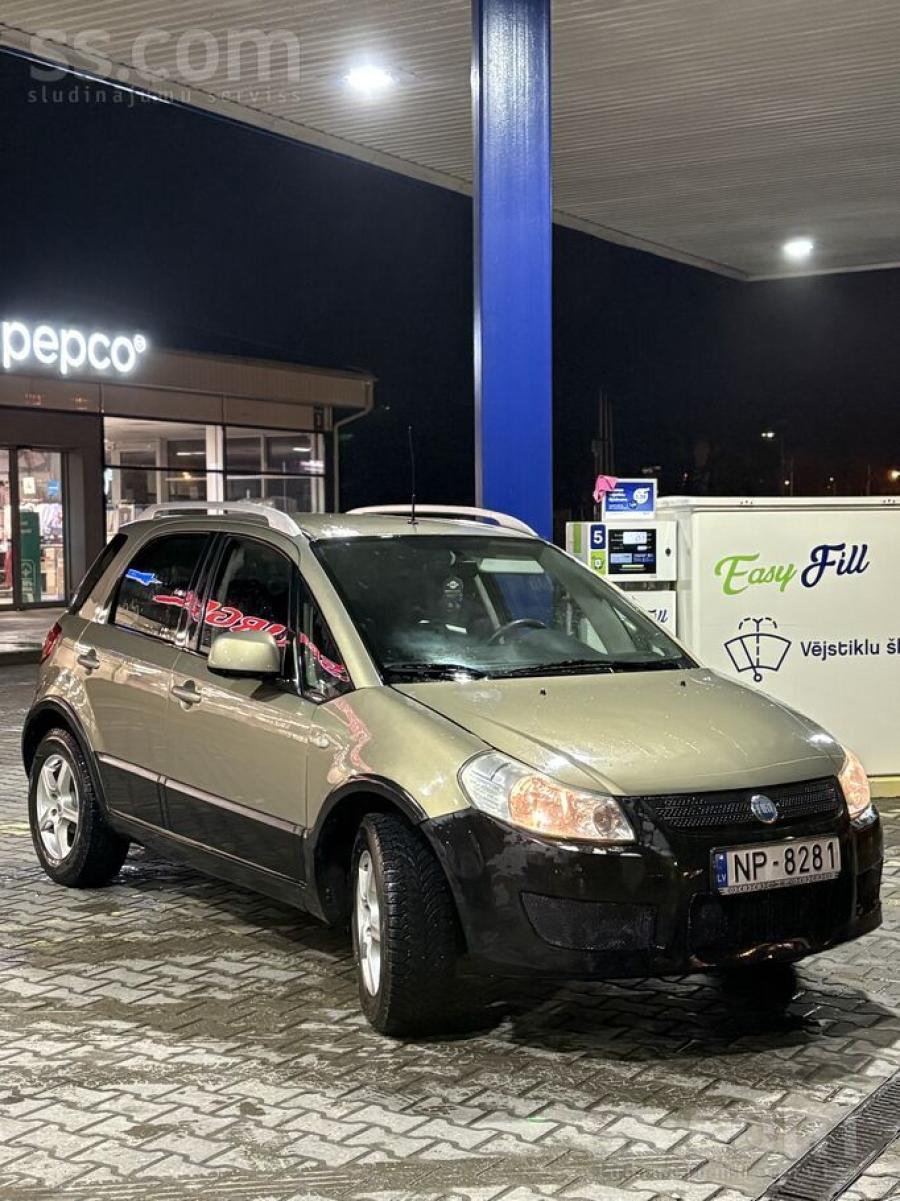 Green Fiat Sedici 2006 in Kuldiga, with an engine capacity of 1.90 L and mileage of 328 thousand km for 2300 €, photo 5 on AUTOMOTO.COM.LV