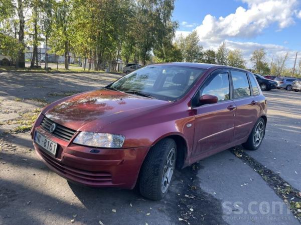 Sarkans Fiat Stilo 2005 Rīga, ar dzinēja tilpumu 1.90 L un nobraukumu 253 tūkst. km par 1000 €, foto 3 vietnē AUTOMOTO.COM.LV