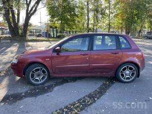 Sarkans Fiat Stilo 2005 Rīga, ar dzinēja tilpumu 1.90 L un nobraukumu 253 tūkst. km par 1000 €, foto 4 vietnē AUTOMOTO.COM.LV
