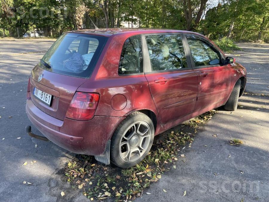 Sarkans Fiat Stilo 2005 Rīga, ar dzinēja tilpumu 1.90 L un nobraukumu 253 tūkst. km par 1000 €, foto 8 vietnē AUTOMOTO.COM.LV