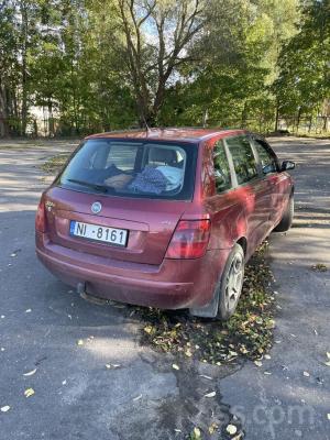 Sarkans Fiat Stilo 2005 Rīga, ar dzinēja tilpumu 1.90 L un nobraukumu 253 tūkst. km par 1000 €, foto 9 vietnē AUTOMOTO.COM.LV