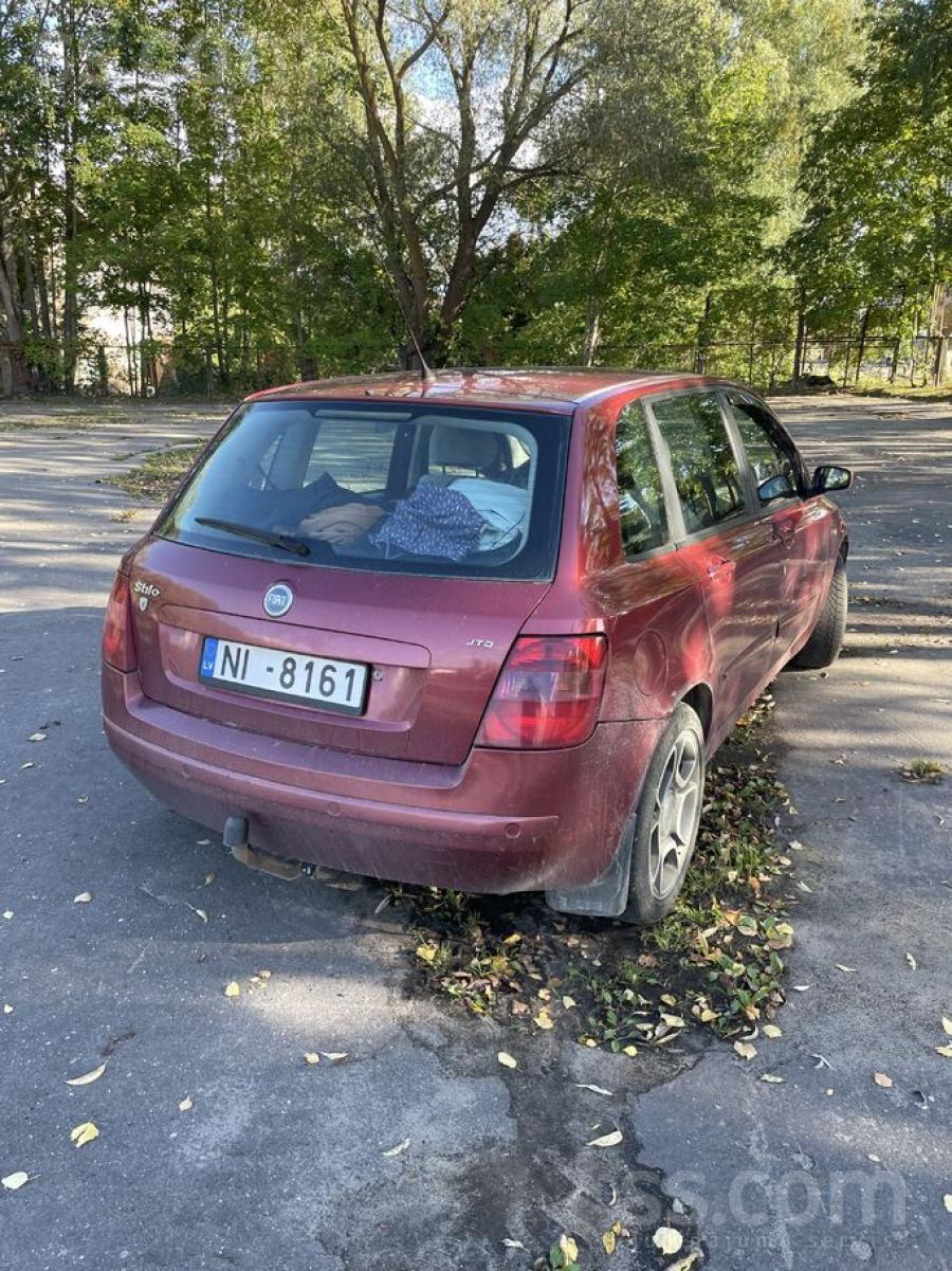 Sarkans Fiat Stilo 2005 Rīga, ar dzinēja tilpumu 1.90 L un nobraukumu 253 tūkst. km par 1000 €, foto 9 vietnē AUTOMOTO.COM.LV