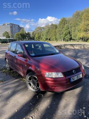 Sarkans Fiat Stilo 2005 Rīga, ar dzinēja tilpumu 1.90 L un nobraukumu 253 tūkst. km par 1000 €, foto 10 vietnē AUTOMOTO.COM.LV