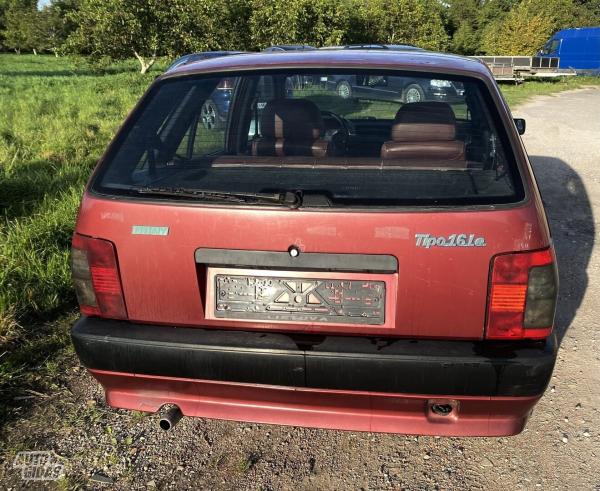 Red Fiat Tipo 1992 in Kaunas, with an engine capacity of 1.60 L and mileage of 216 thousand km for 800 €, photo 4 on AUTOMOTO.COM.LV
