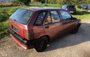 Red Fiat Tipo 1992 in Kaunas, with an engine capacity of 1.60 L and mileage of 216 thousand km for 800 €, photo 5 on AUTOMOTO.COM.LV