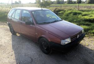 Red Fiat Tipo 1992 in Kaunas, with an engine capacity of 1.60 L and mileage of 216 thousand km for 800 €, photo 6 on AUTOMOTO.COM.LV