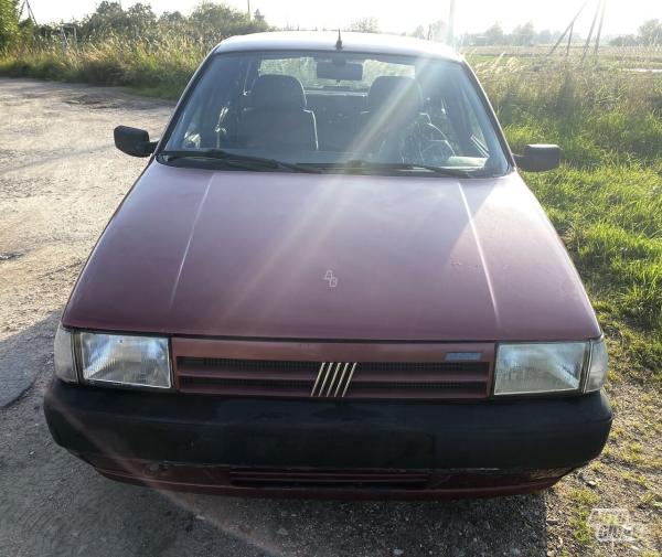 Red Fiat Tipo 1992 in Kaunas, with an engine capacity of 1.60 L and mileage of 216 thousand km for 800 €, photo 7 on AUTOMOTO.COM.LV