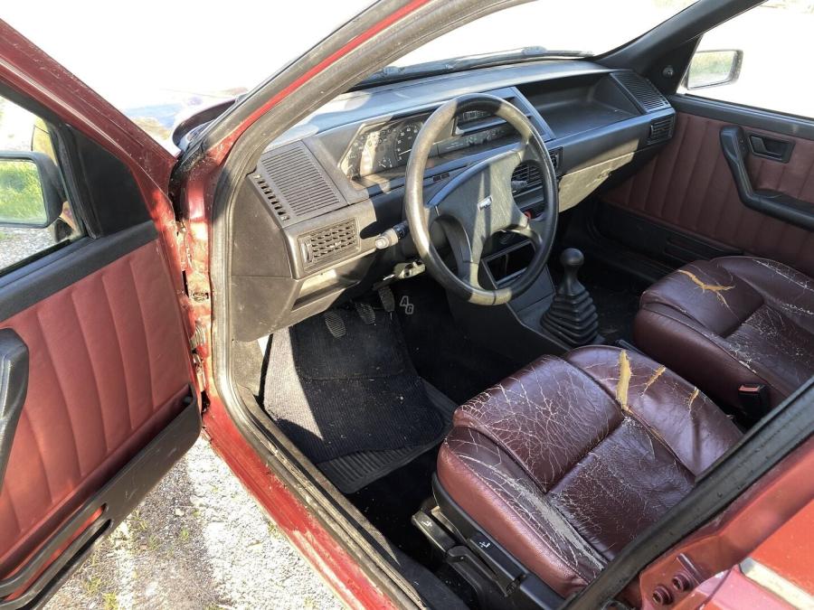 Red Fiat Tipo 1992 in Kaunas, with an engine capacity of 1.60 L and mileage of 216 thousand km for 800 €, photo 9 on AUTOMOTO.COM.LV