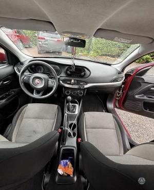 Red Fiat Tipo 2016 in Elektrenai, with an engine capacity of 1.37 L and mileage of 156 thousand km for 5400 €, photo 14 on AUTOMOTO.COM.LV