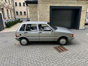 Pelēks Fiat Uno 1987 Rīga, ar dzinēja tilpumu 1.50 L un nobraukumu 70 tūkst. km par 8200 €, foto 4 vietnē AUTOMOTO.COM.LV