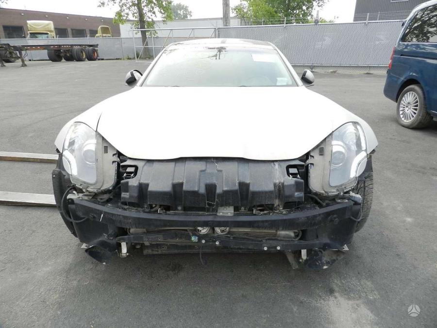 Black Fisker Karma 2012 in Klaipeda, with an engine capacity of 2.00 L and mileage of 55 thousand km for 12900 €, photo 13 on AUTOMOTO.COM.LV