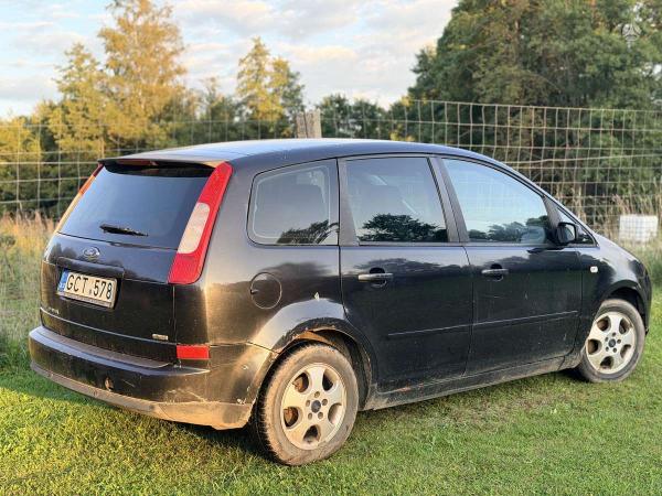 Black Ford C-Max 2007 in Utena, with an engine capacity of 1.56 L and mileage of 275 thousand km for 320 €, photo 4 on AUTOMOTO.COM.LV