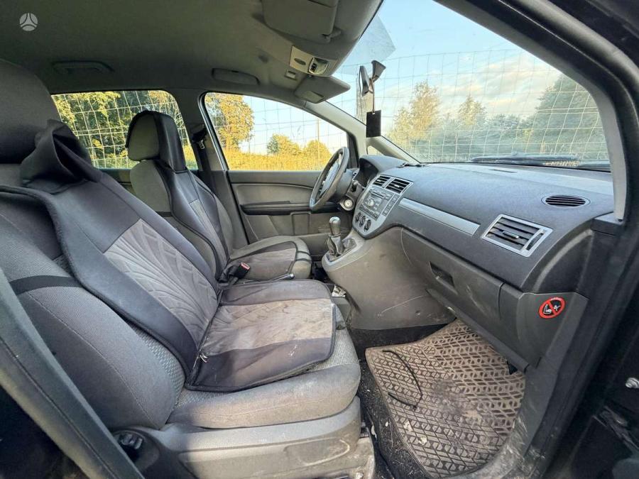 Black Ford C-Max 2007 in Utena, with an engine capacity of 1.56 L and mileage of 275 thousand km for 320 €, photo 7 on AUTOMOTO.COM.LV