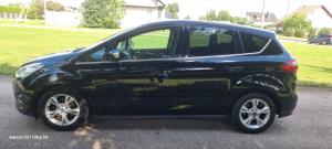 Black Ford C-Max 2012 in Kedainiai, with an engine capacity of 1.00 L and mileage of 174 thousand km for 3999 €, photo 9 on AUTOMOTO.COM.LV