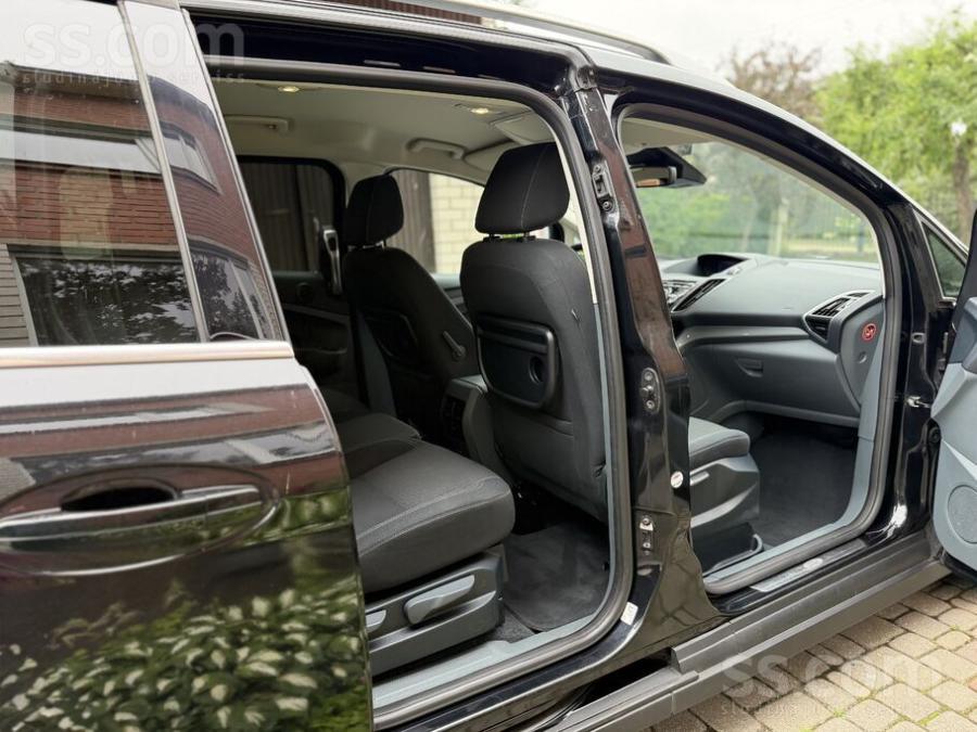 Black Ford C-Max 2013 in Valmiera, with an engine capacity of 1.60 L and mileage of 209 thousand km for 4995 €, photo 18 on AUTOMOTO.COM.LV