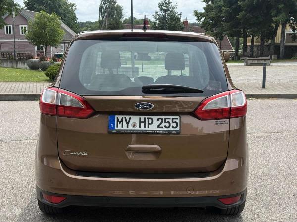 Ford C-Max 2014 in Raseiniai on AUTOMOTO.COM.LV Brown Ford C-Max 2014 in Raseiniai, with an engine capacity of 2.00 L and mileage of 265 thousand km for 4300 €, photo 6 on AUTOMOTO.COM.LV