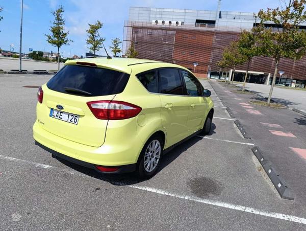 Ford C-Max 2011 in Klaipeda on AUTOMOTO.COM.LV Yellow Ford C-Max 2011 in Klaipeda, with an engine capacity of 2.00 L and mileage of 310 thousand km for 3600 €, photo 4 on AUTOMOTO.COM.LV