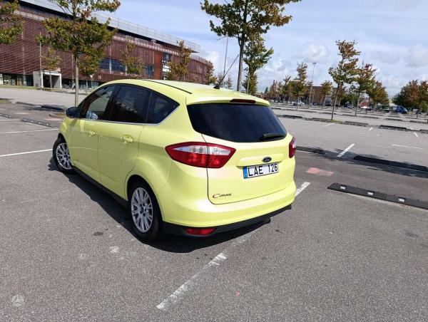 Ford C-Max 2011 in Klaipeda on AUTOMOTO.COM.LV Yellow Ford C-Max 2011 in Klaipeda, with an engine capacity of 2.00 L and mileage of 310 thousand km for 3600 €, photo 5 on AUTOMOTO.COM.LV