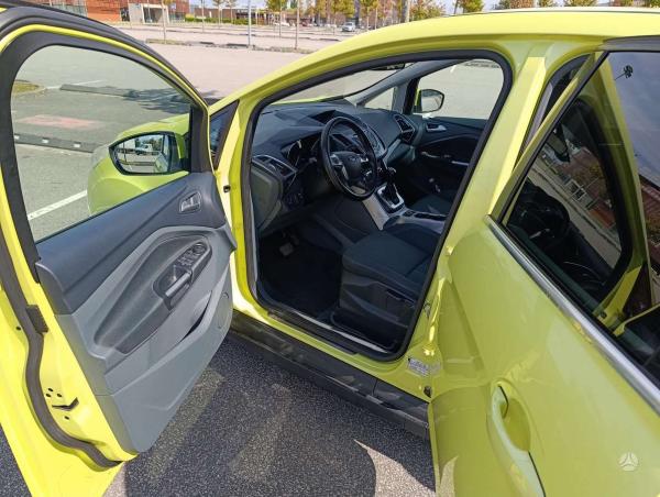 Ford C-Max 2011 in Klaipeda on AUTOMOTO.COM.LV Yellow Ford C-Max 2011 in Klaipeda, with an engine capacity of 2.00 L and mileage of 310 thousand km for 3600 €, photo 10 on AUTOMOTO.COM.LV