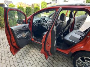 Oranžs Ford EcoSport 2015 Viļņa, ar dzinēja tilpumu 1.50 L un nobraukumu 159 tūkst. km par 6450 €, foto 23 vietnē AUTOMOTO.COM.LV