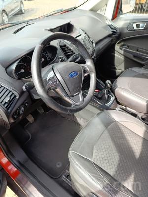 Orange Ford EcoSport 2016 in Valmiera, with an engine capacity of 1.00 L and mileage of 125 thousand km for 6990 €, photo 15 on AUTOMOTO.COM.LV