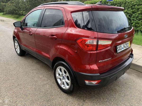 Red Ford EcoSport 2020 in Utena, with an engine capacity of 1.00 L and mileage of 90 thousand km for 8990 €, photo 6 on AUTOMOTO.COM.LV