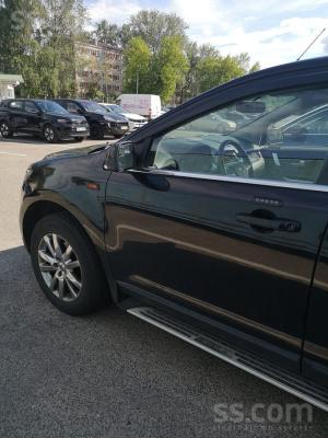 Black Ford Edge 2012 in Riga, with an engine capacity of 3.50 L and mileage of 213 thousand km for 8600 €, photo 4 on AUTOMOTO.COM.LV