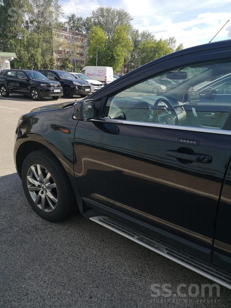 Black Ford Edge 2012 in Riga, with an engine capacity of 3.50 L and mileage of 213 thousand km for 8600 €, photo 4 on AUTOMOTO.COM.LV