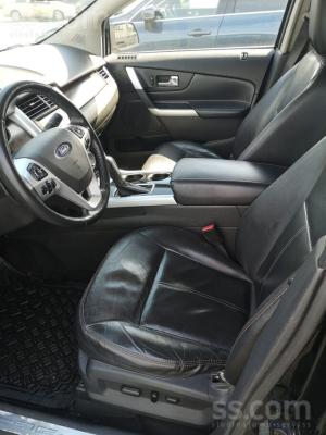 Black Ford Edge 2012 in Riga, with an engine capacity of 3.50 L and mileage of 213 thousand km for 8600 €, photo 6 on AUTOMOTO.COM.LV