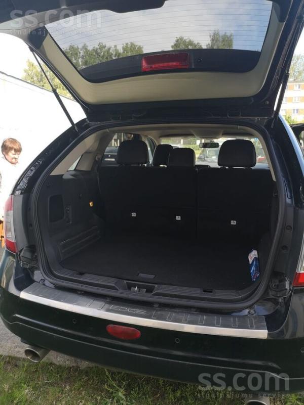Black Ford Edge 2012 in Riga, with an engine capacity of 3.50 L and mileage of 213 thousand km for 8600 €, photo 8 on AUTOMOTO.COM.LV