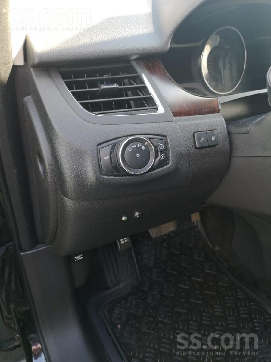 Black Ford Edge 2012 in Riga, with an engine capacity of 3.50 L and mileage of 213 thousand km for 8600 €, photo 8 on AUTOMOTO.COM.LV
