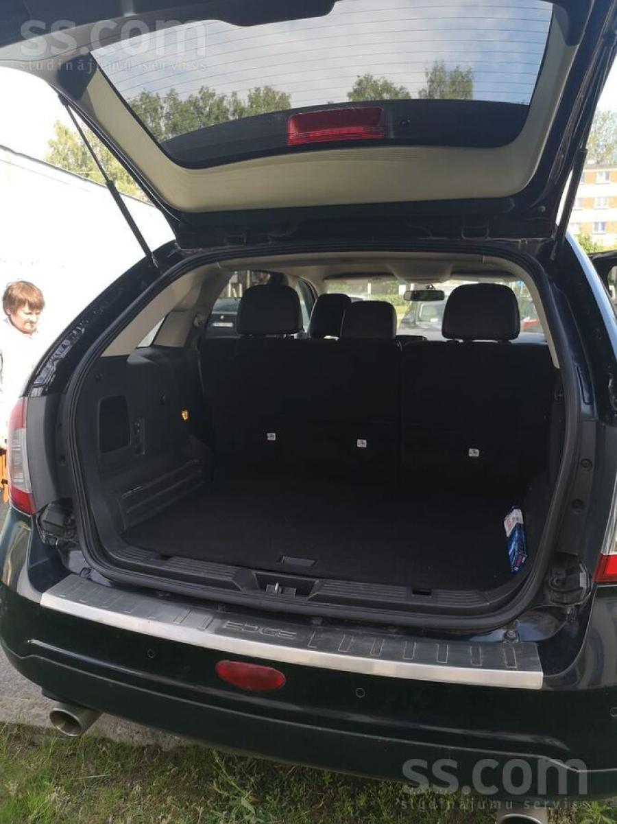 Black Ford Edge 2012 in Riga, with an engine capacity of 3.50 L and mileage of 213 thousand km for 8600 €, photo 9 on AUTOMOTO.COM.LV