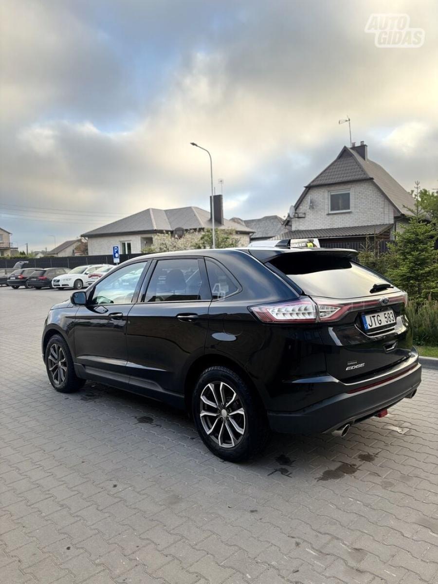 Black Ford Edge 2015 in Kretinga, with an engine capacity of 3.50 L and mileage of 168 thousand km for 9399 €, photo 9 on AUTOMOTO.COM.LV