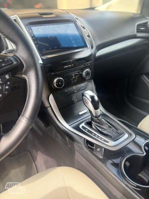 Black Ford Edge 2015 in Kretinga, with an engine capacity of 3.50 L and mileage of 168 thousand km for 9399 €, photo 26 on AUTOMOTO.COM.LV
