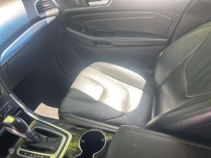 Black Ford Edge 2016 in Siauliai, with an engine capacity of 2.00 L and mileage of 270 thousand km for 9900 €, photo 12 on AUTOMOTO.COM.LV